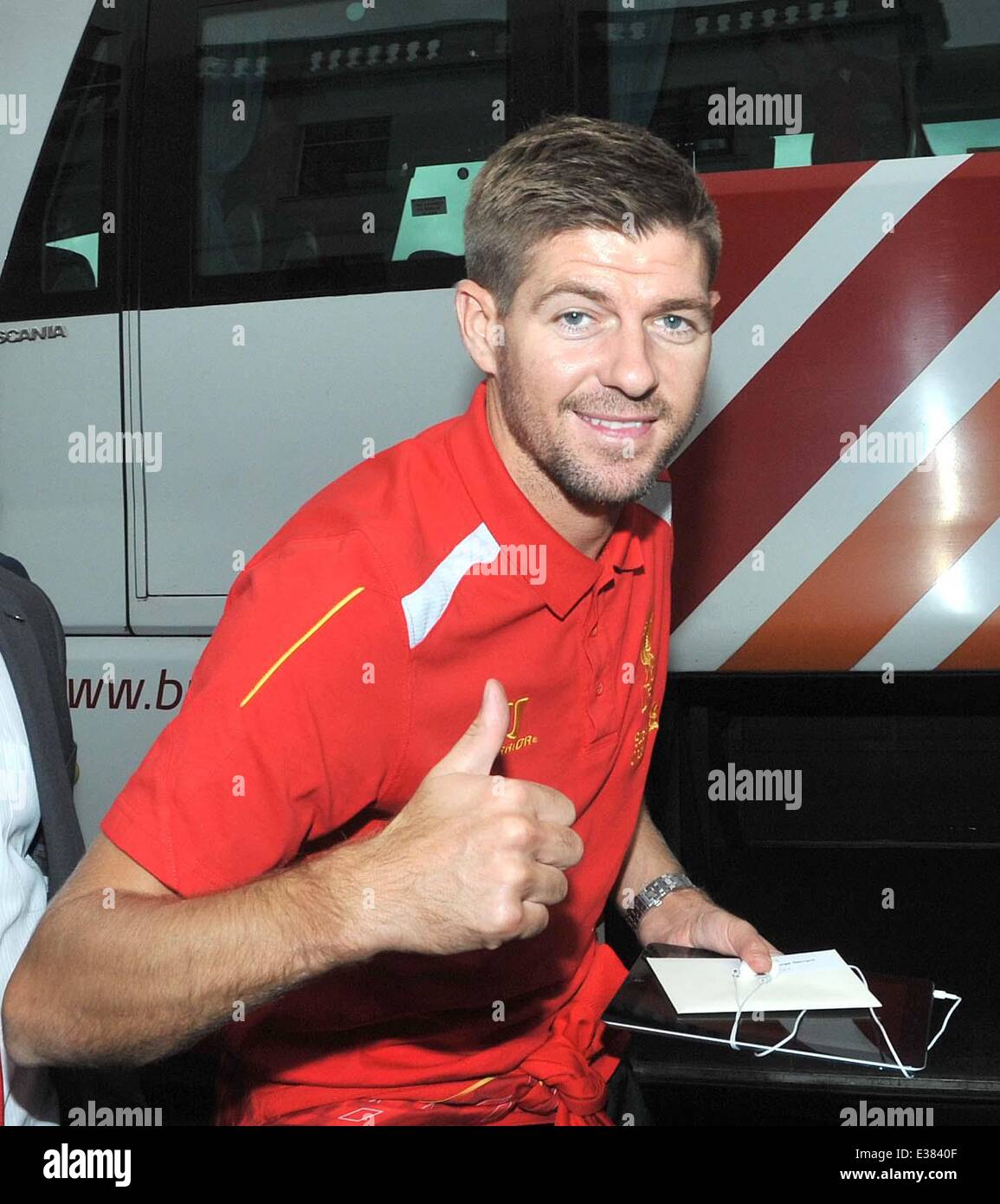 Liverpool F.C. football players, lead by captain Steven Gerrard, arrive ...
