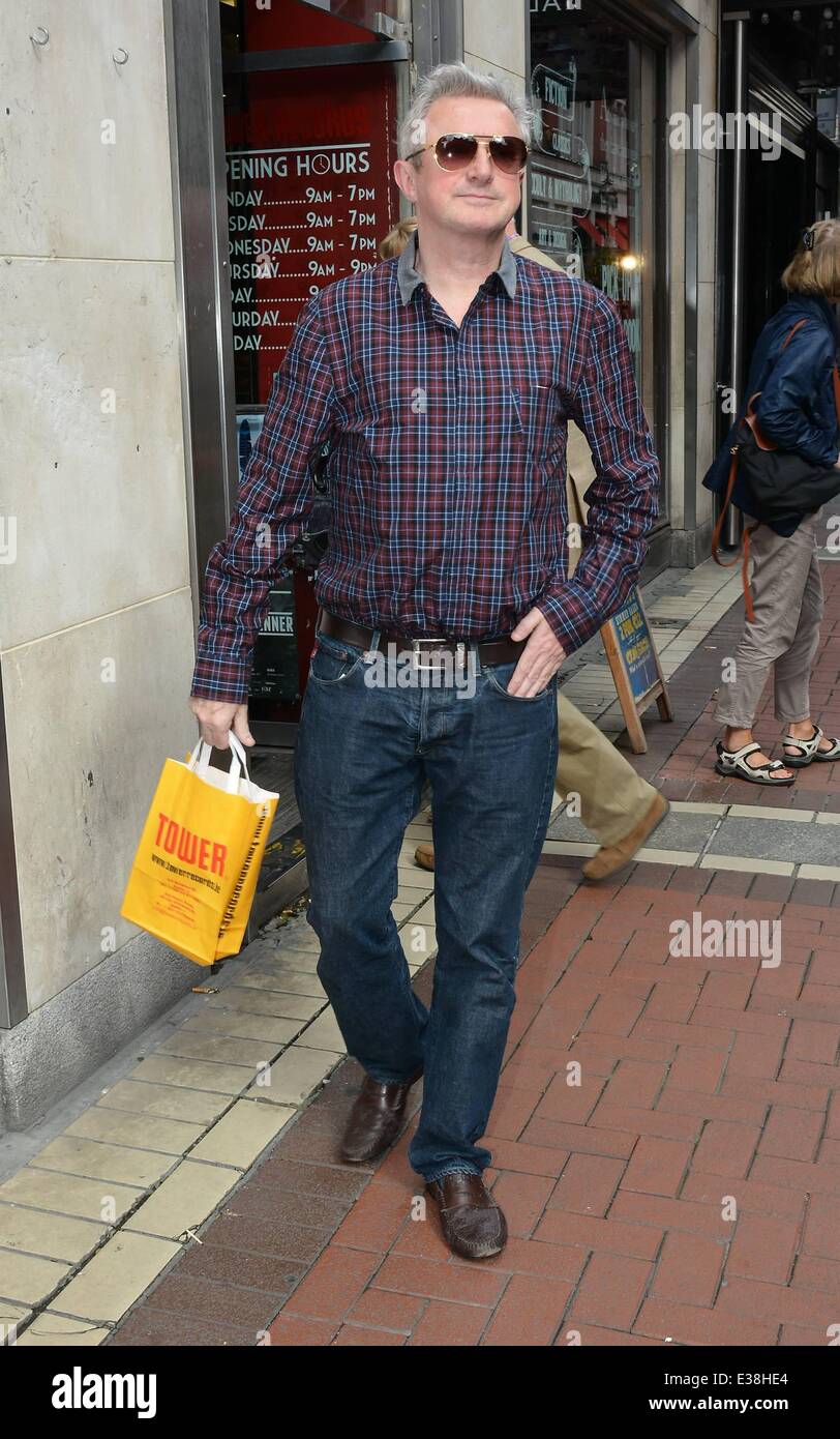 X Factor judge Louis Walsh in good spirits as he leaves Tower Records ...