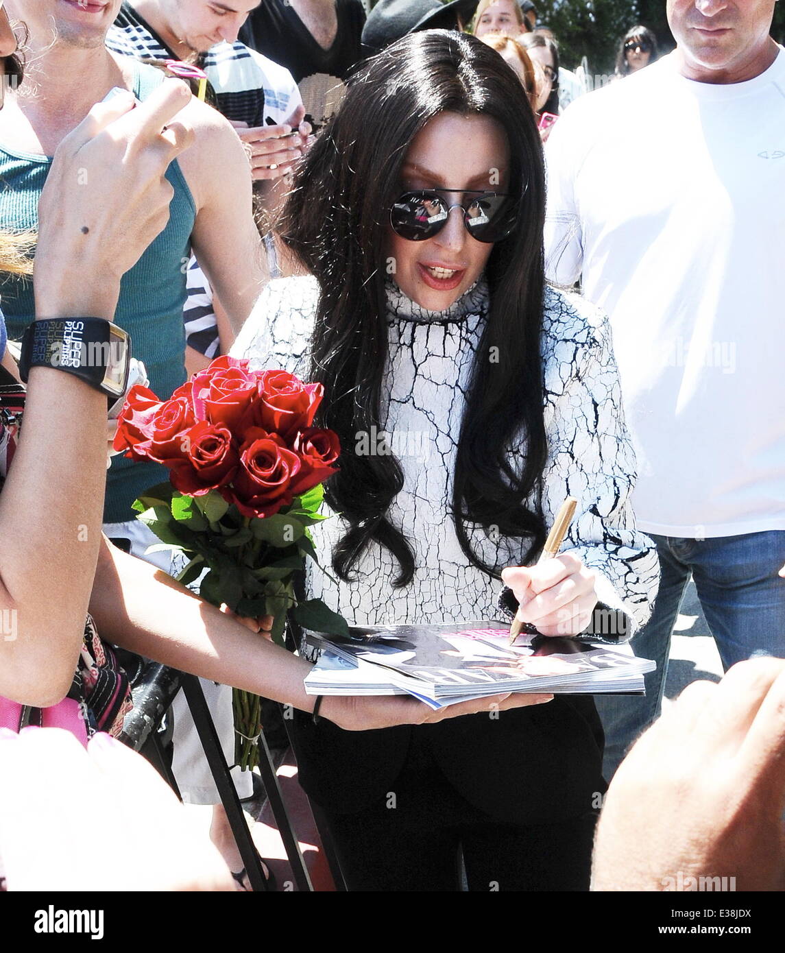 Lady Gaga seen signing autographs and taking pictures with her fans at ...