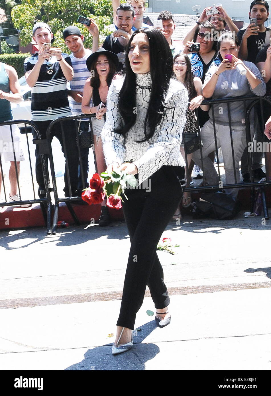 Lady Gaga seen signing autographs and taking pictures with her fans at ...