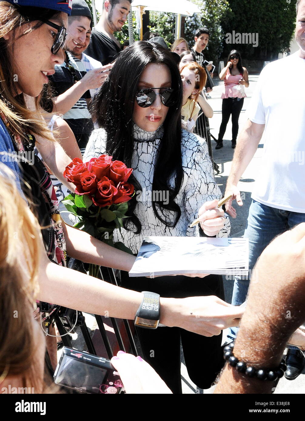 Lady Gaga seen signing autographs and taking pictures with her fans at ...