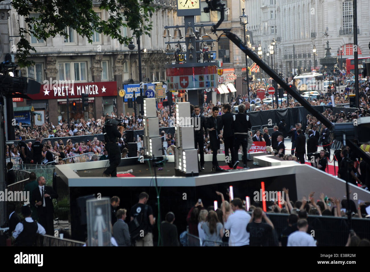 One Direction pictured on stage in Leicester Square at the premiere of ...
