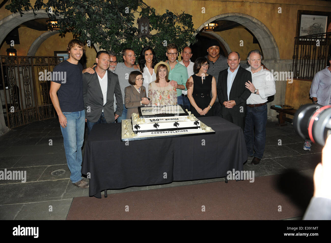 Cast and crew of NCIS: LOS ANGELES on set for a cake-cutting to ...