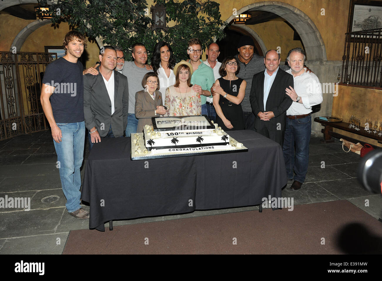 Cast and crew of NCIS: LOS ANGELES on set for a cake-cutting to ...