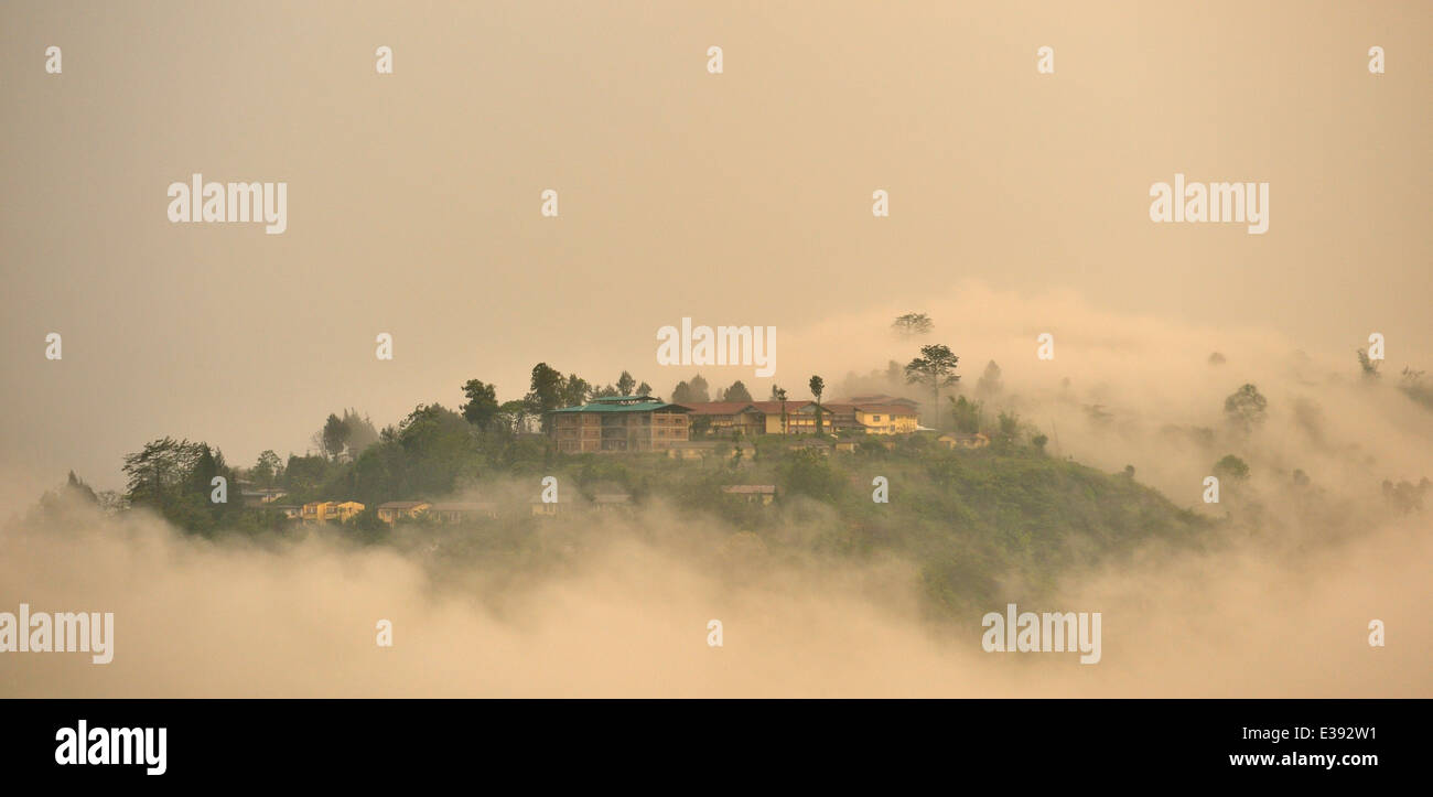 Distant view in low cloud on approach to Samdrup Jongkhar, Easter ...