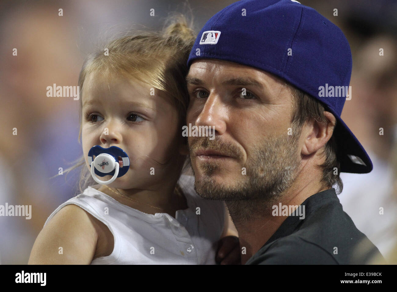 Doting father David Beckham takes his baby daughter Harper to the Los ...