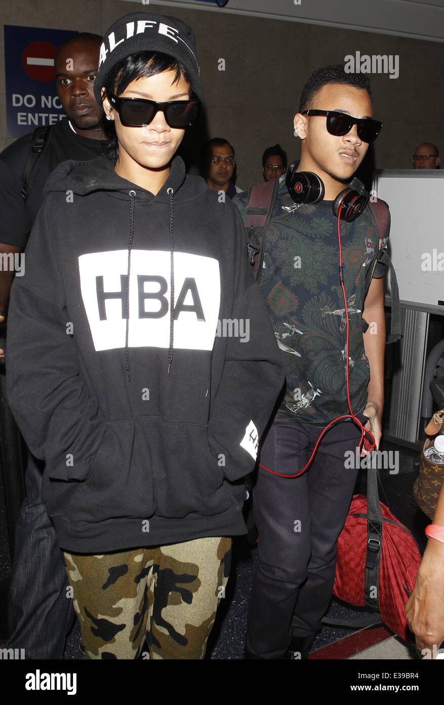 Rihanna and her younger brother Rajad arrive at Los Angeles ...