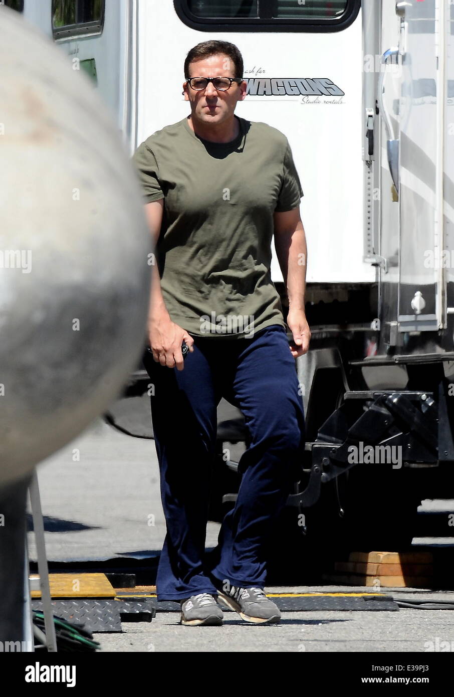 Comedian actor Steve Carell shows off his chest muscles wearing workout ...