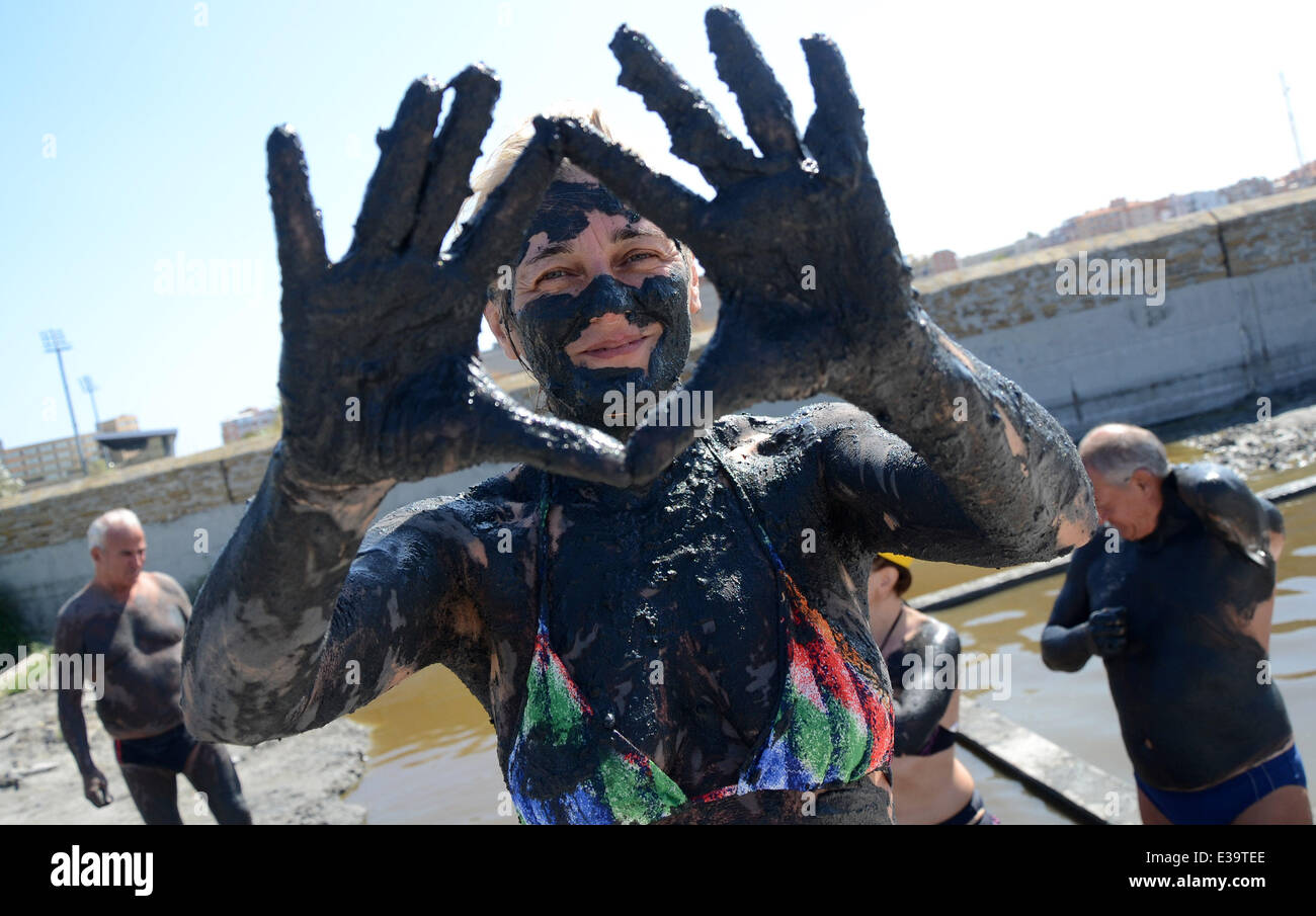 People smear black mud over their bodies as they try to cure ailments ...