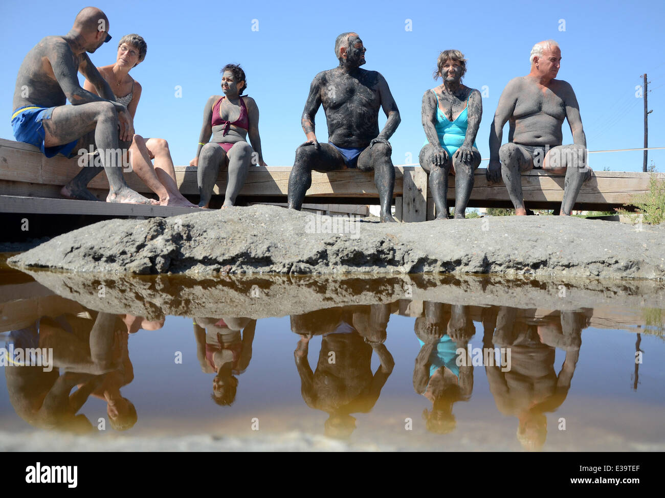People smear black mud over their bodies as they try to cure ailments ...