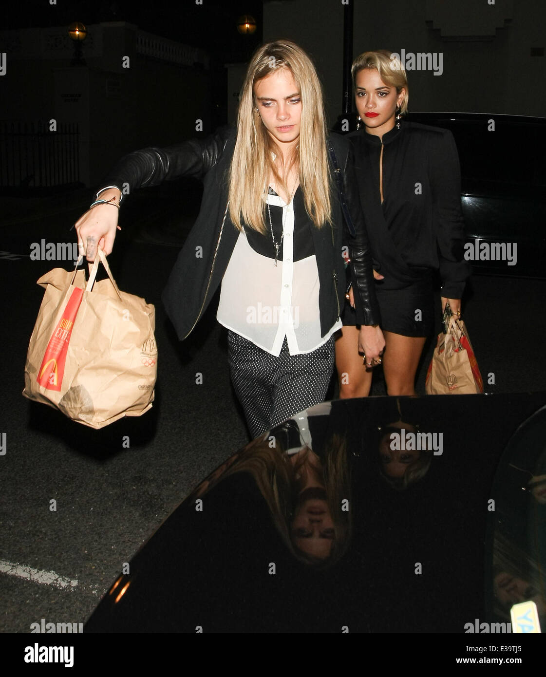 Cara Delevingne and Rita Ora return back to Cara's home with large bags ...