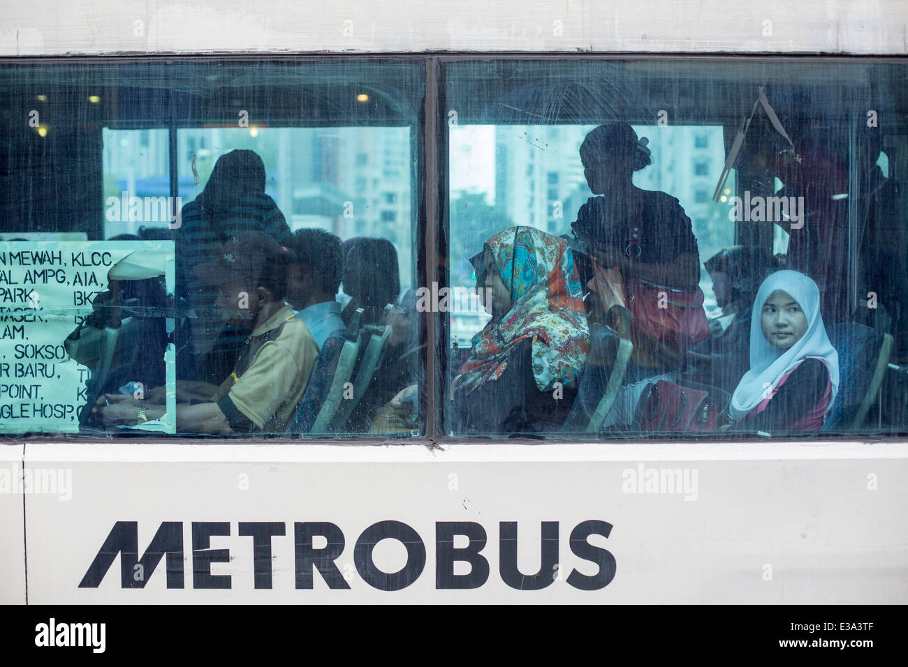 Passengers on a commuter bus in central Kuala Lumpur, Malaysia Stock ...