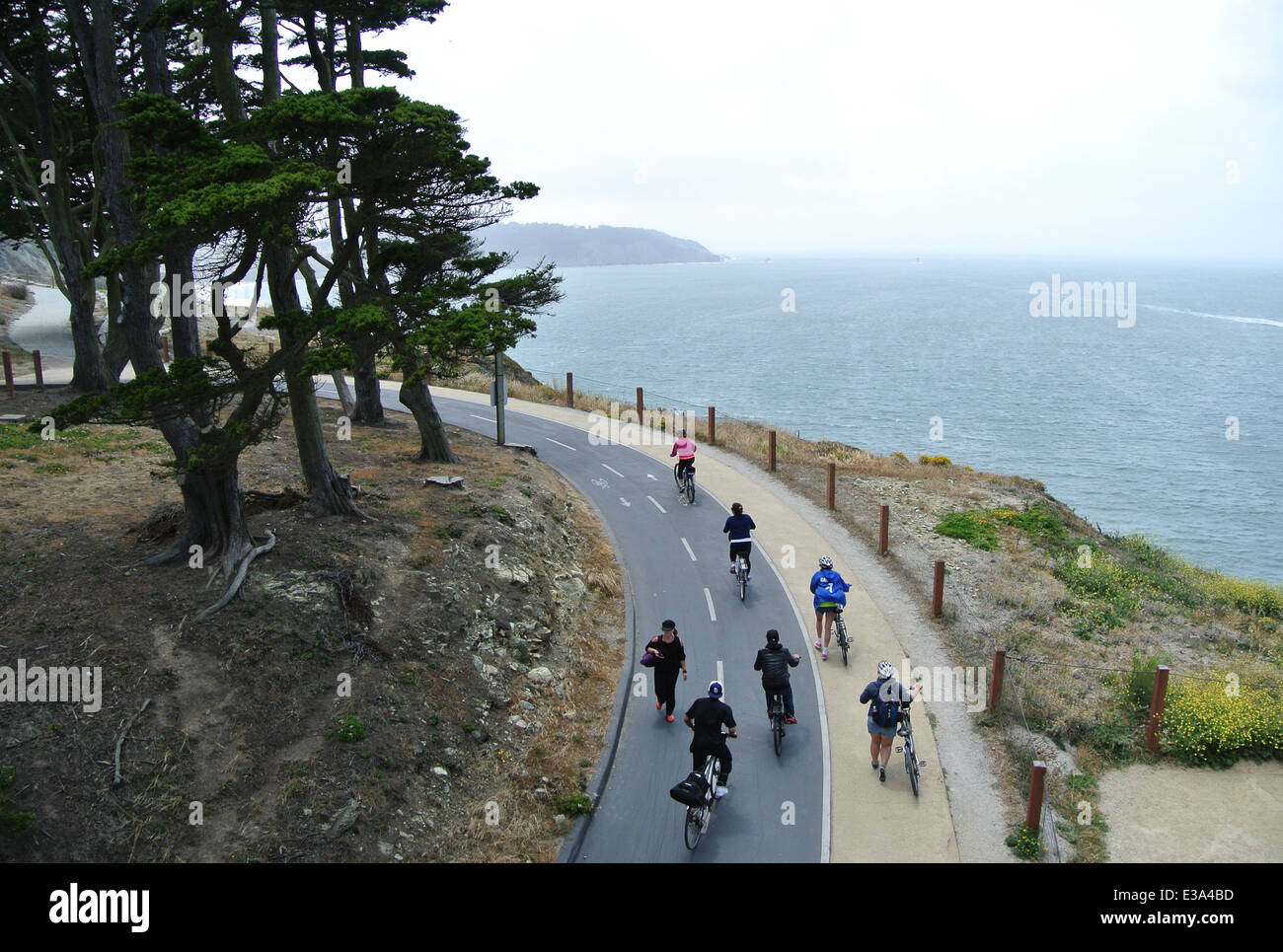 tourists, cyclists and pedestrians use the new multi use path leading ...