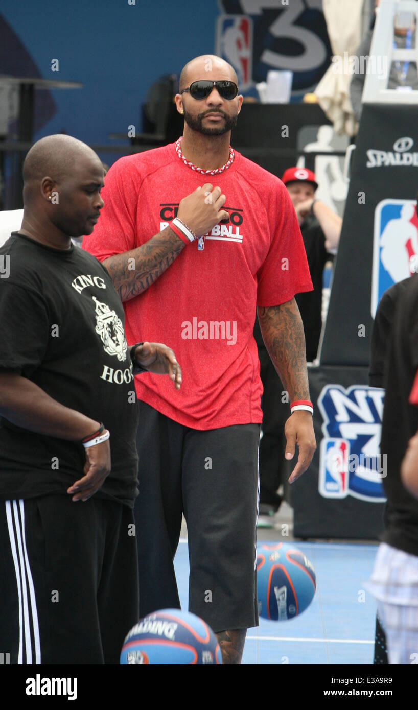NBA superstar and Chicago Bulls power forward Carlos Boozer hosts the ...