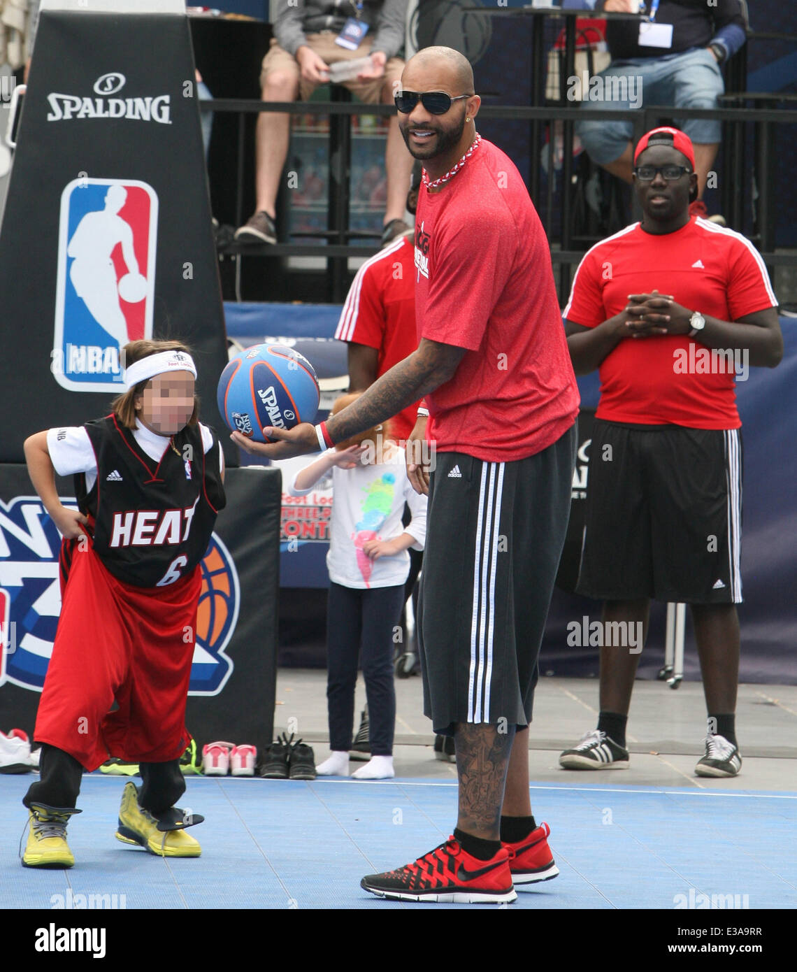 NBA superstar and Chicago Bulls power forward Carlos Boozer hosts the ...