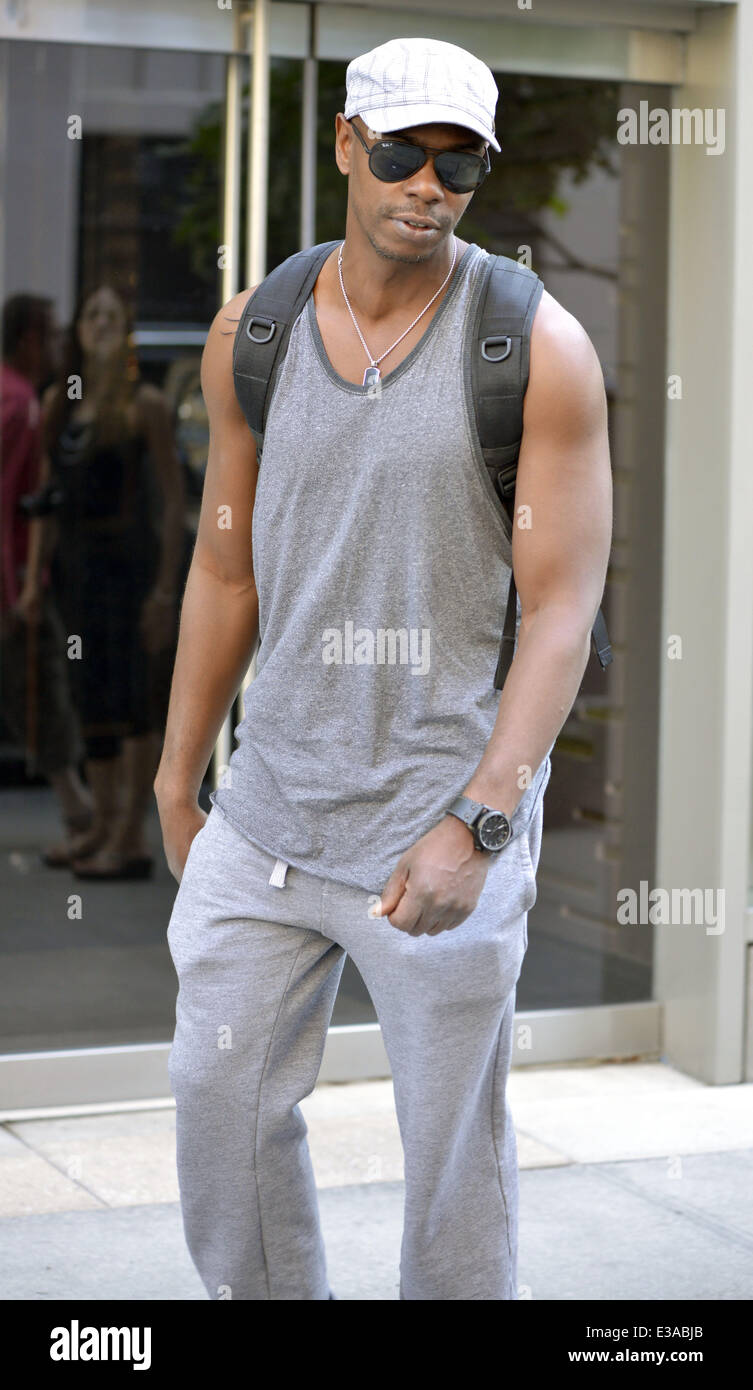 Comedian Dave Chappelle leaving his hotel wearing a backpack Featuring ...