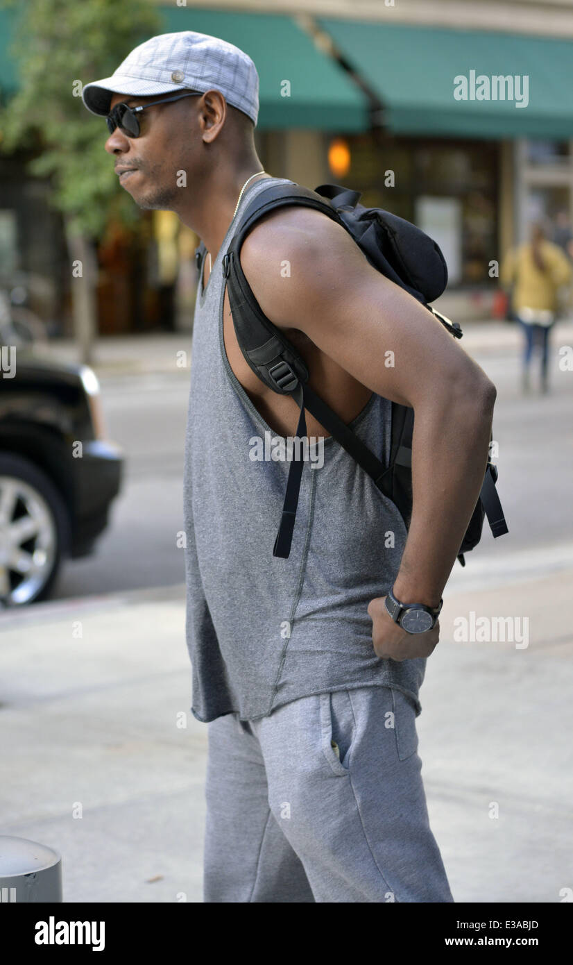 Comedian Dave Chappelle leaving his hotel wearing a backpack Featuring ...