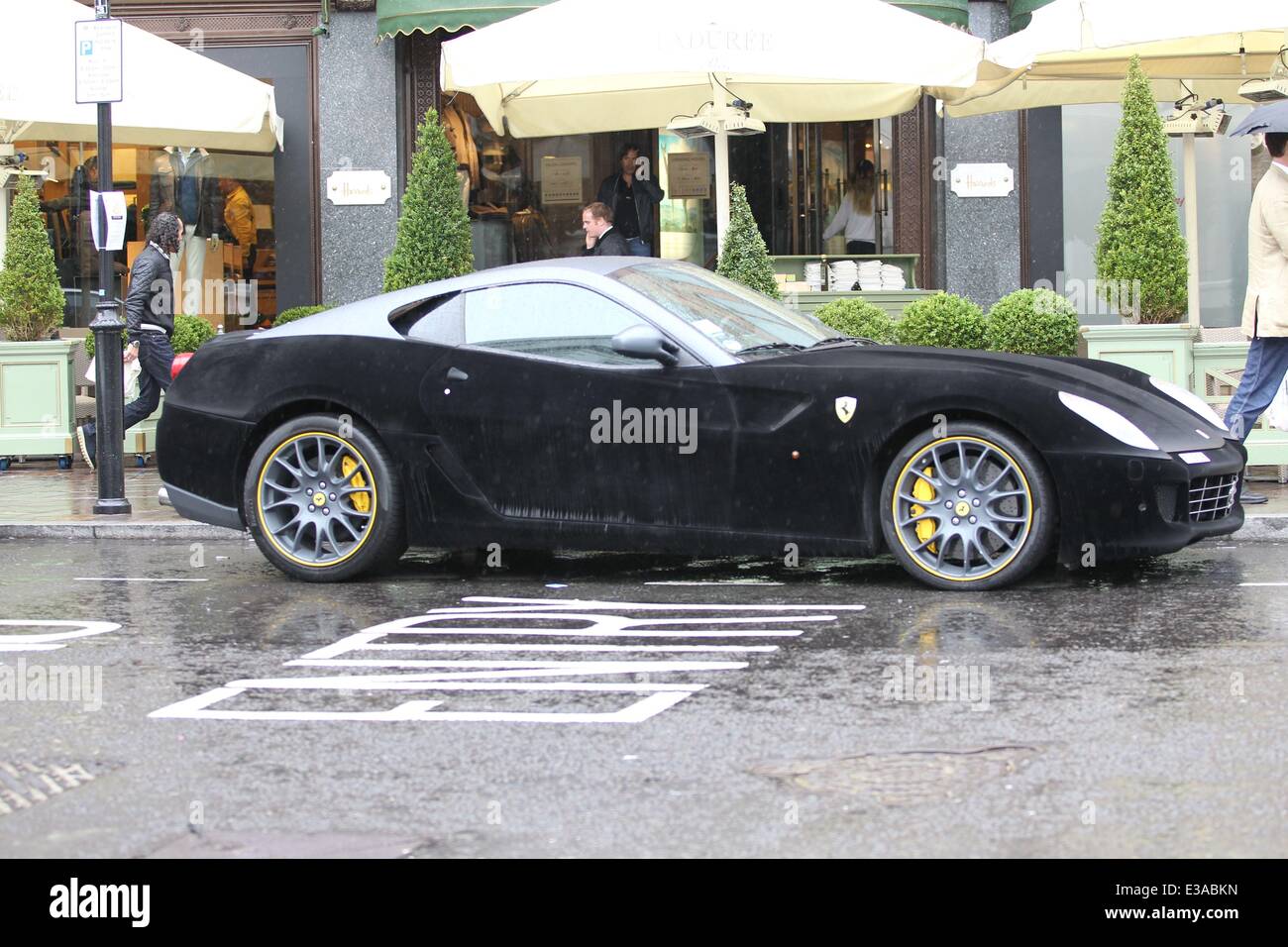 A velvet covered Ferrari seen parked at the rear of Harrods in ...