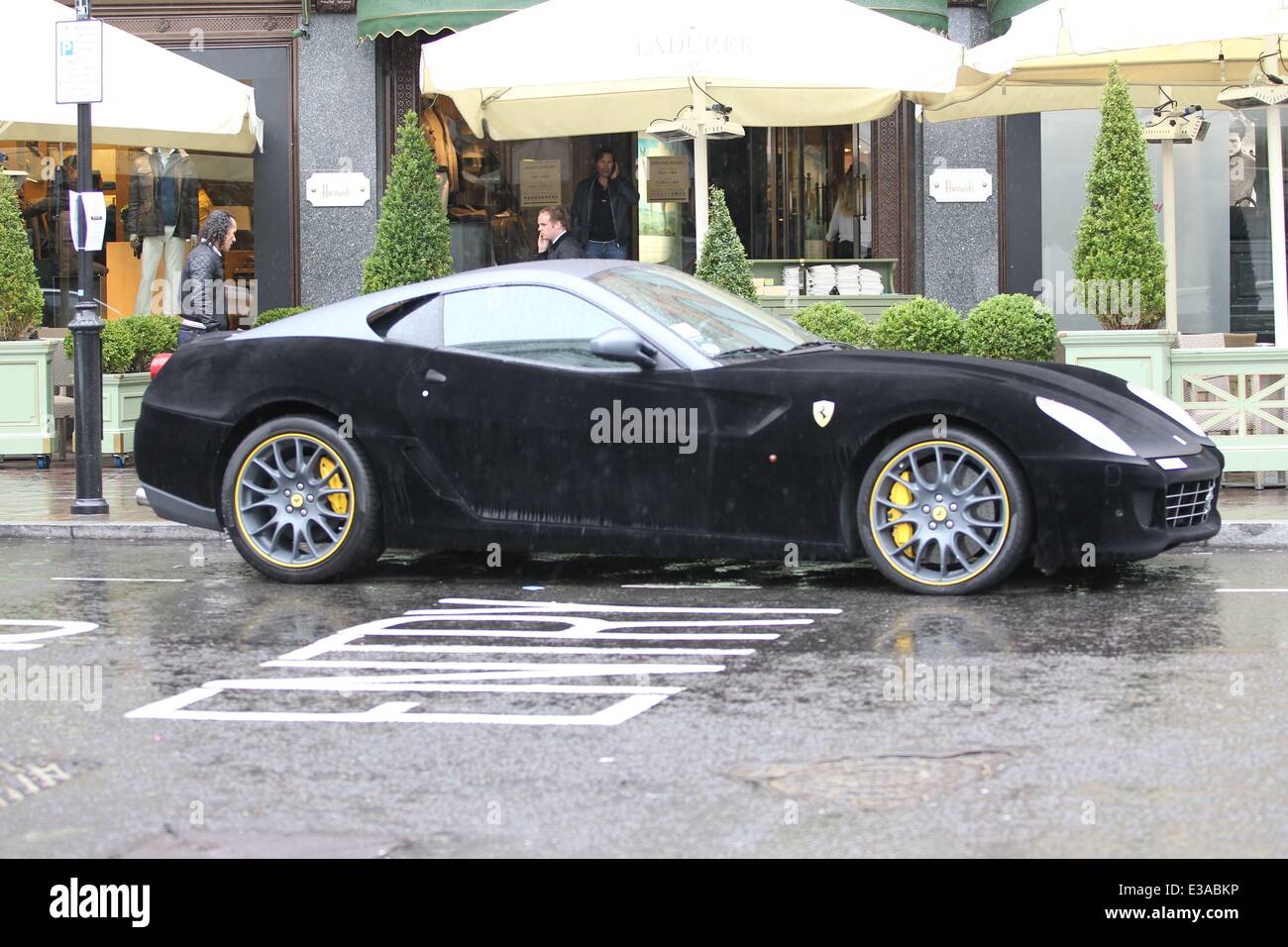 A velvet covered Ferrari seen parked at the rear of Harrods in ...