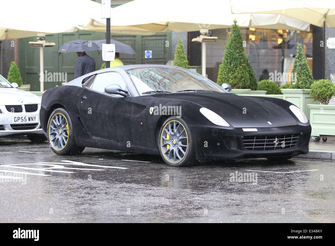 A velvet covered Ferrari seen parked at the rear of Harrods in ...