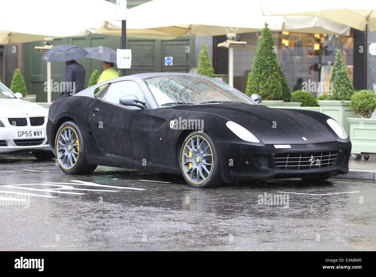 A velvet covered Ferrari seen parked at the rear of Harrods in ...