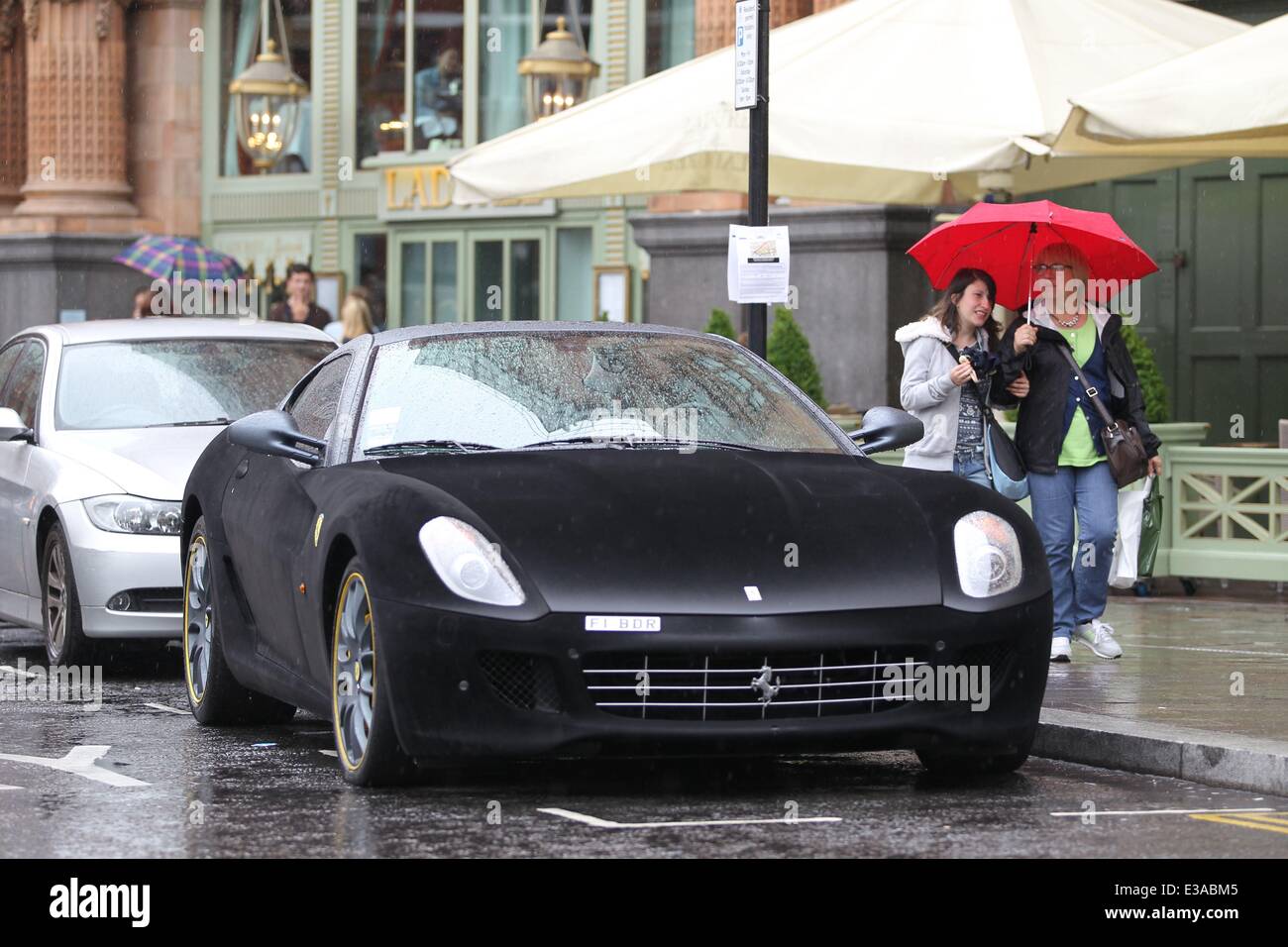 A velvet covered Ferrari seen parked at the rear of Harrods in ...