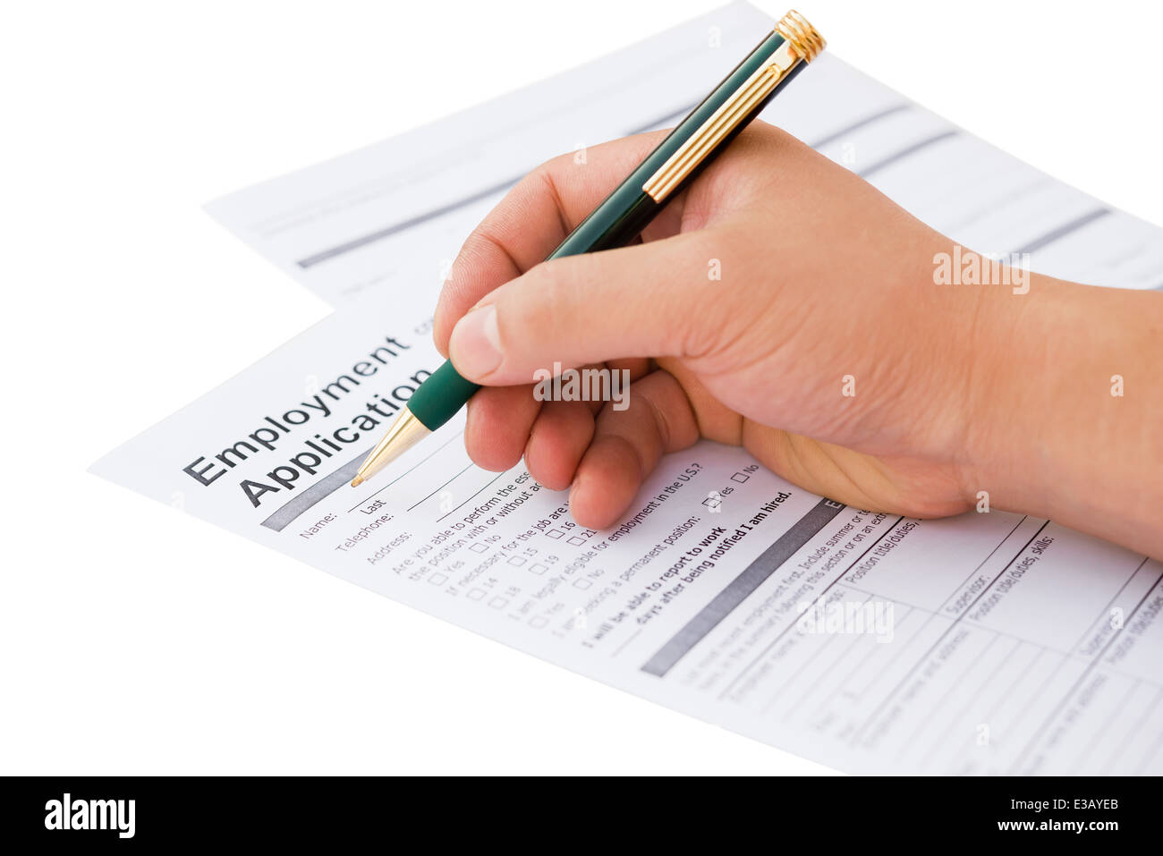 filling an employment application with clipping path Stock Photo - Alamy