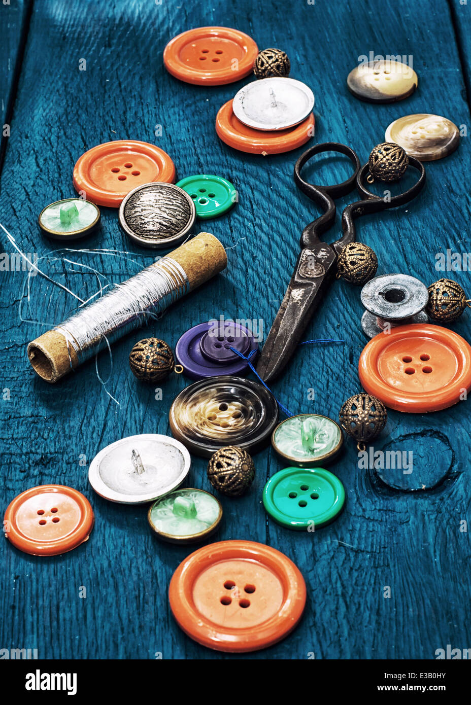 different buttons and zipper on the background of sewing tool Stock ...