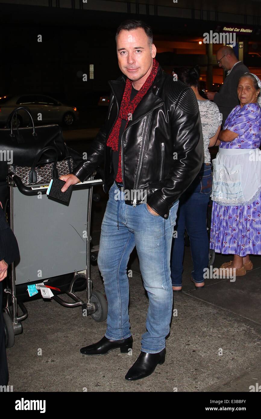 David Furnish arrive at Los Angeles International Airport, LAX ...