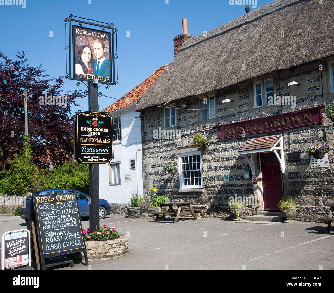 Rose and Crown pub at Tilshead, Wiltshire, England with pub sign ...