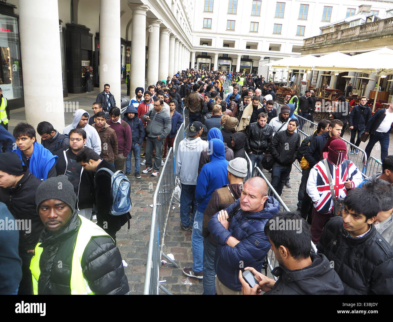 A huge queue formed outside the Apple store in Covent Garden today as ...