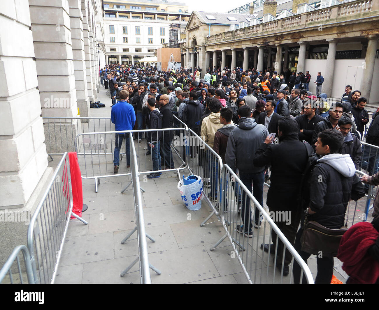 A huge queue formed outside the Apple store in Covent Garden today as ...