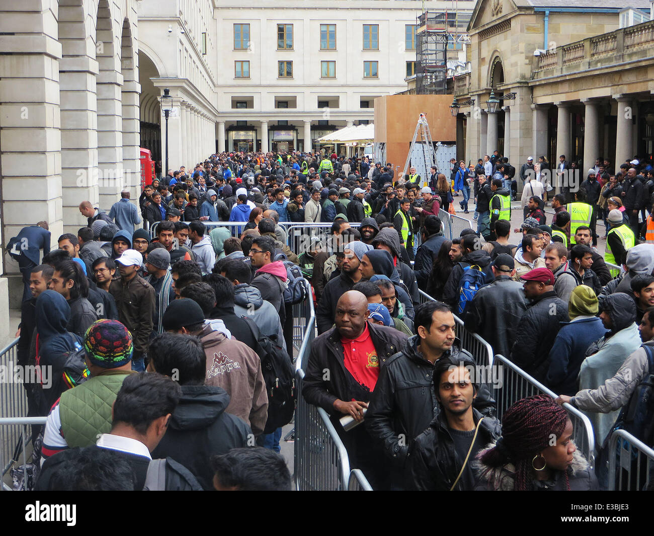 A huge queue formed outside the Apple store in Covent Garden today as ...
