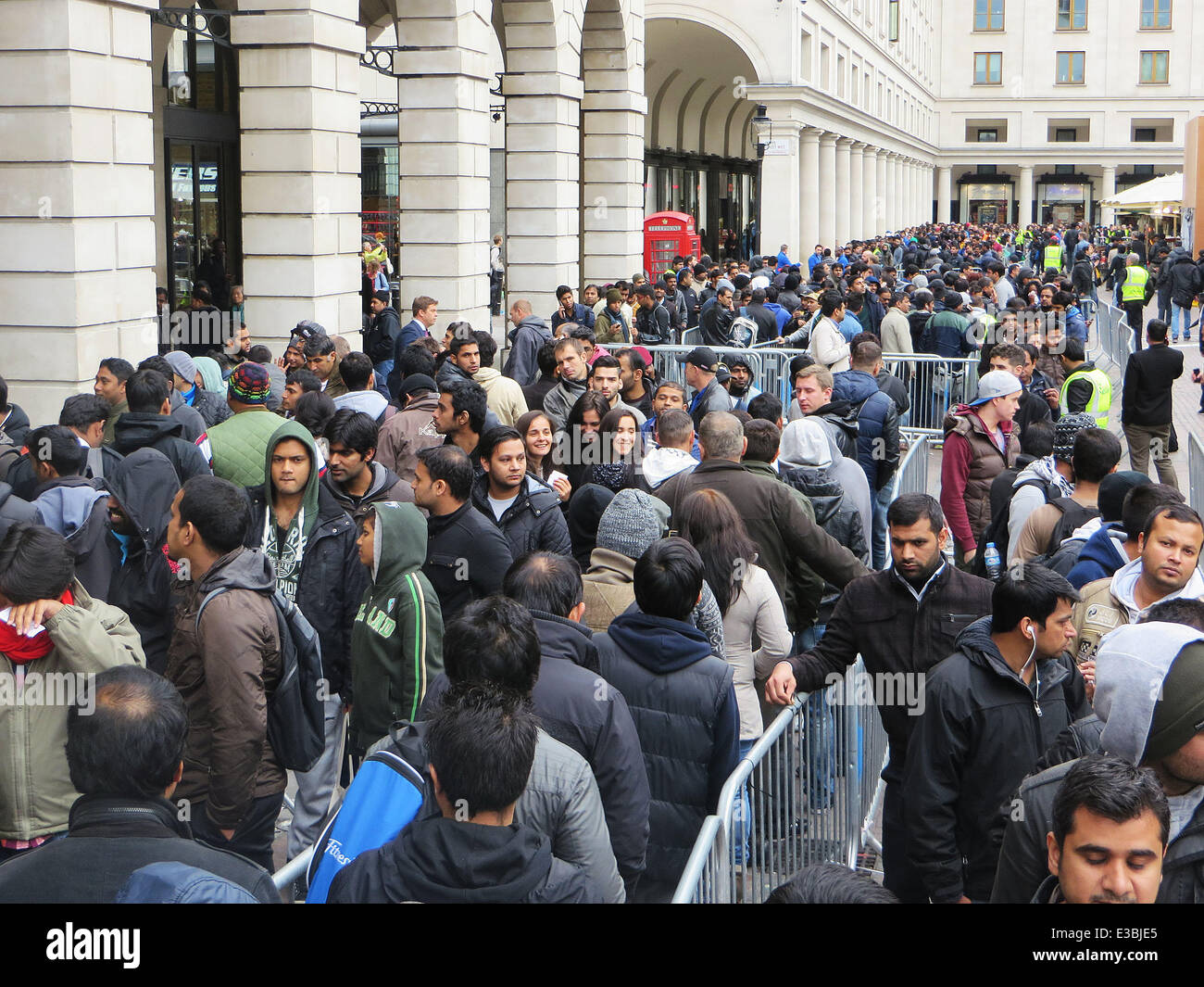 A huge queue formed outside the Apple store in Covent Garden today as ...