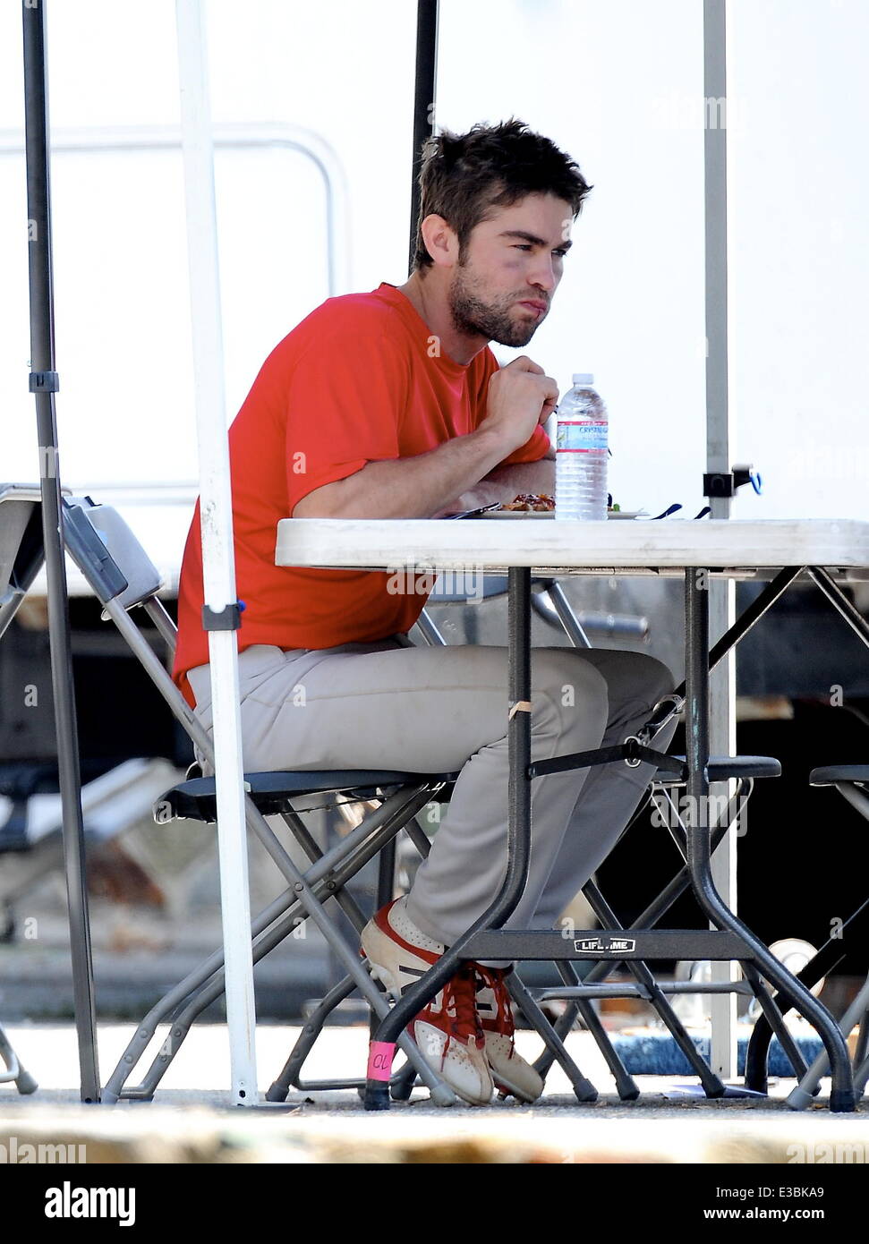 Actor Chace Crawford jumping around on the set of "Undrafted" as he ...