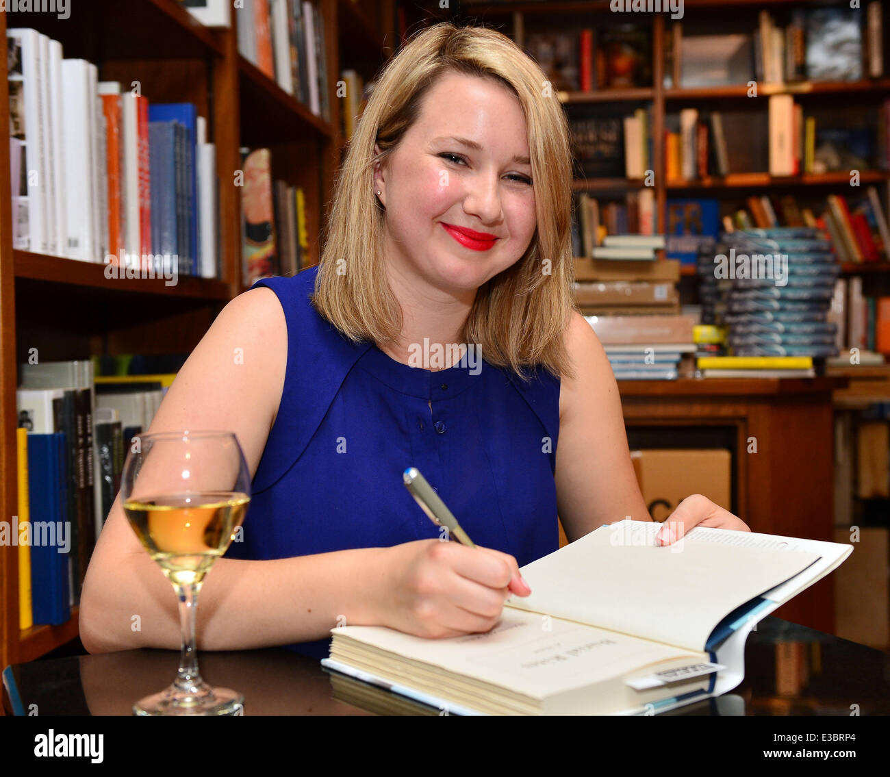 Hannah Kent greets fans and signs copies of her book 'Burial Rites' at ...