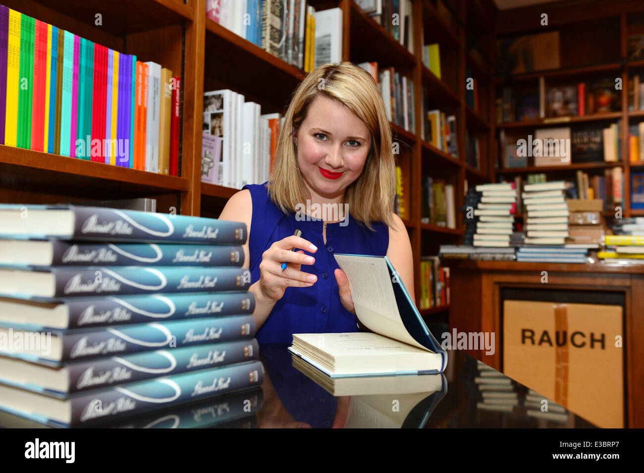 Hannah Kent greets fans and signs copies of her book 'Burial Rites' at ...