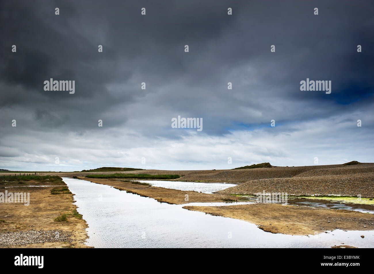Rain clouds gathering over Cley Marshes Stock Photo - Alamy