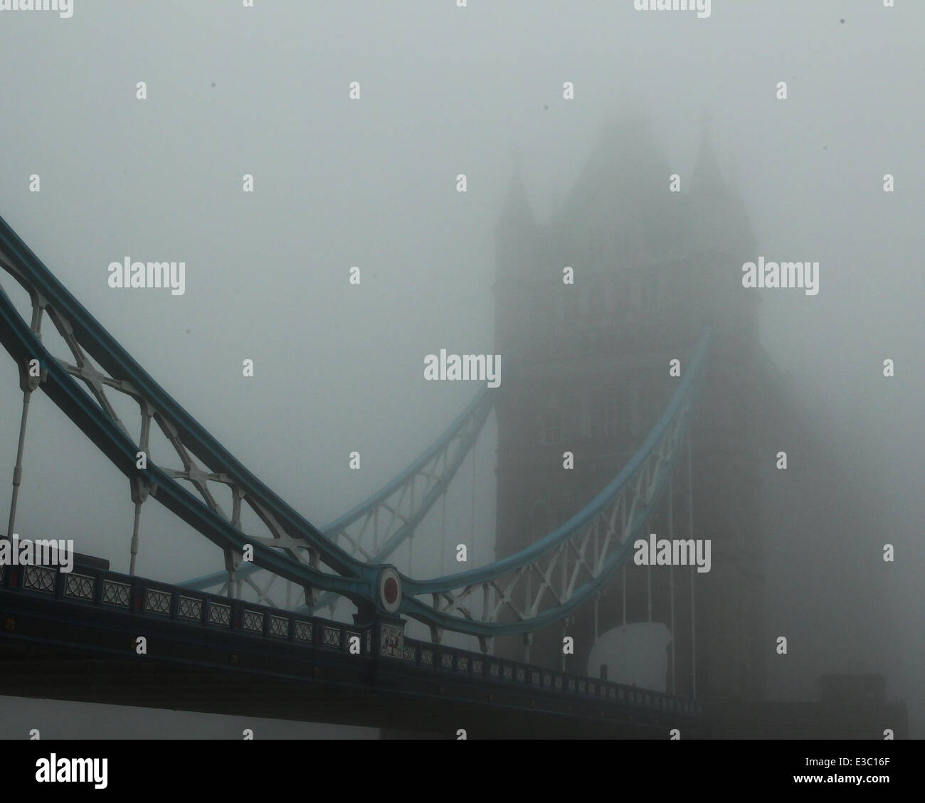 Tower Bridge is shrouded in thick fog Featuring: View Where: London ...