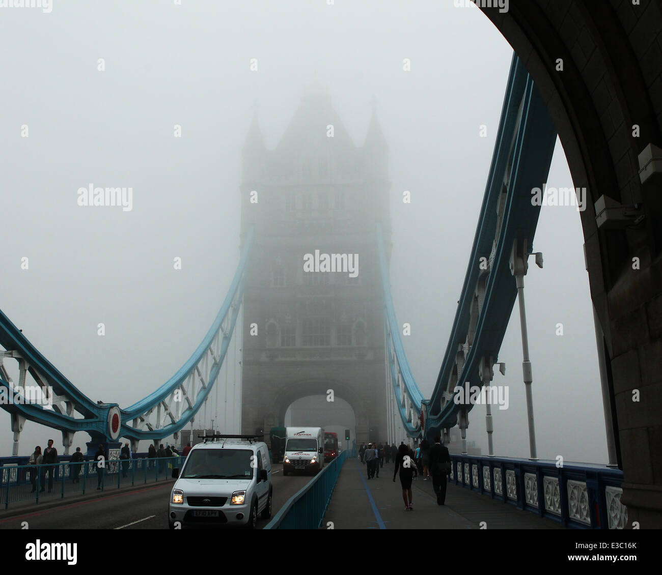 Tower Bridge is shrouded in thick fog Featuring: View Where: London ...