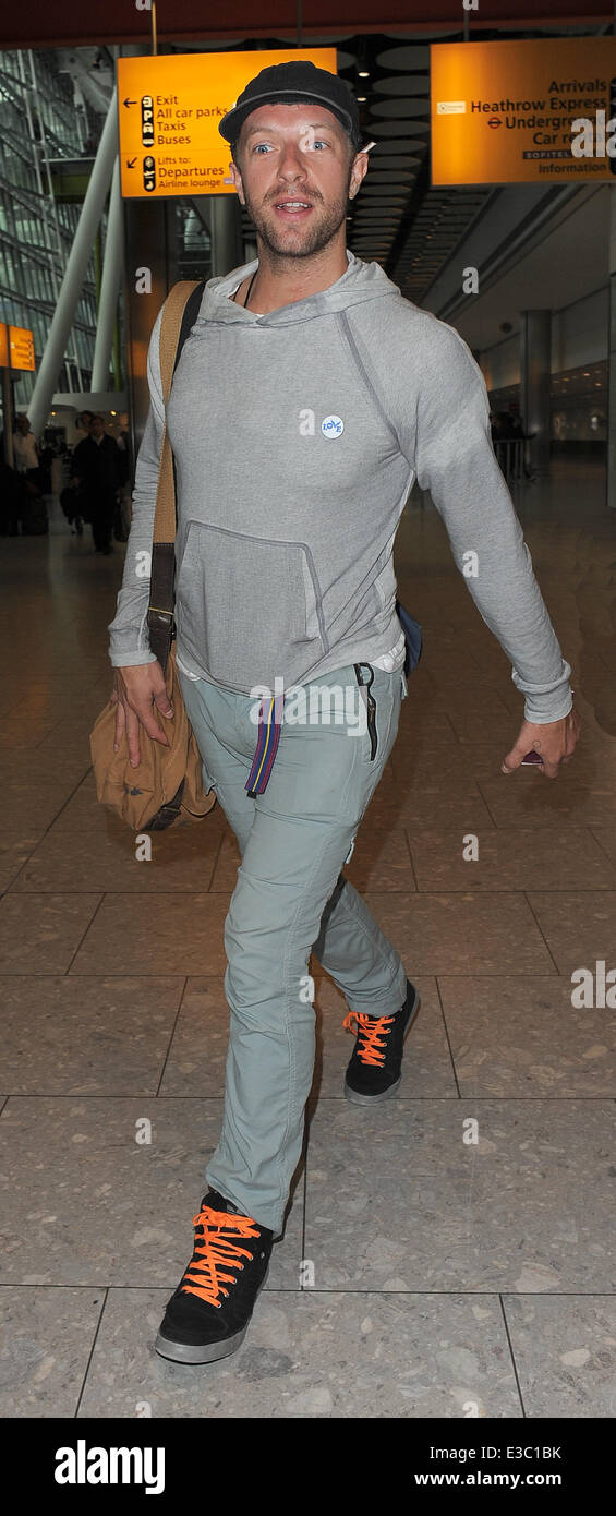 Chris Martin arriving at Heathrow Airport on a flight from Los Angeles ...