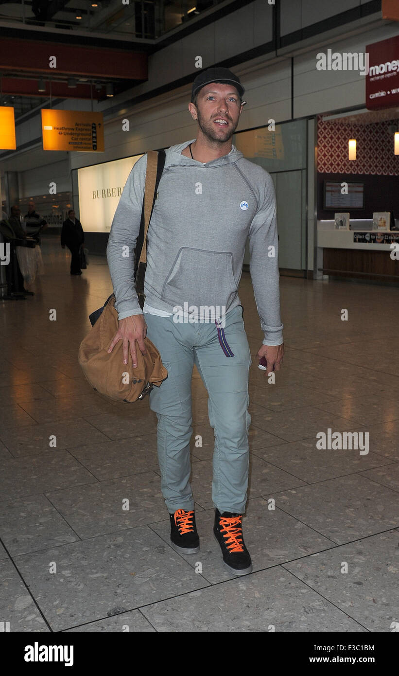 Chris Martin arriving at Heathrow Airport on a flight from Los Angeles ...