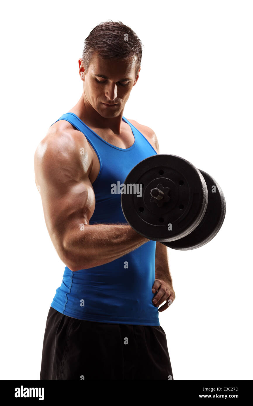 Studio shot of a muscular young man lifting a barbell Stock Photo - Alamy