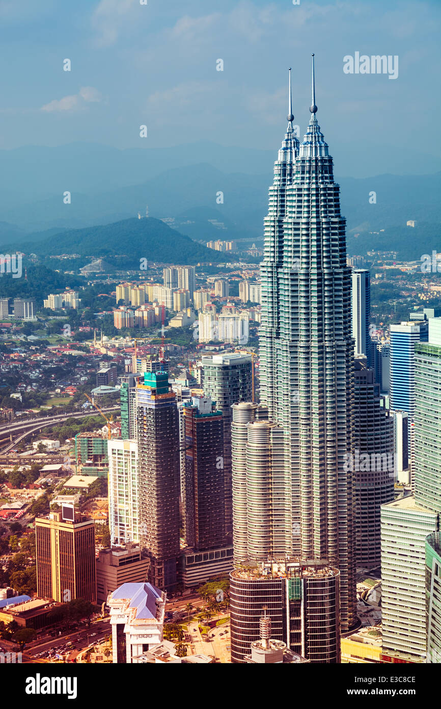 Kuala Lumpur skyline with the Petronas Towers and other skyscrapers ...