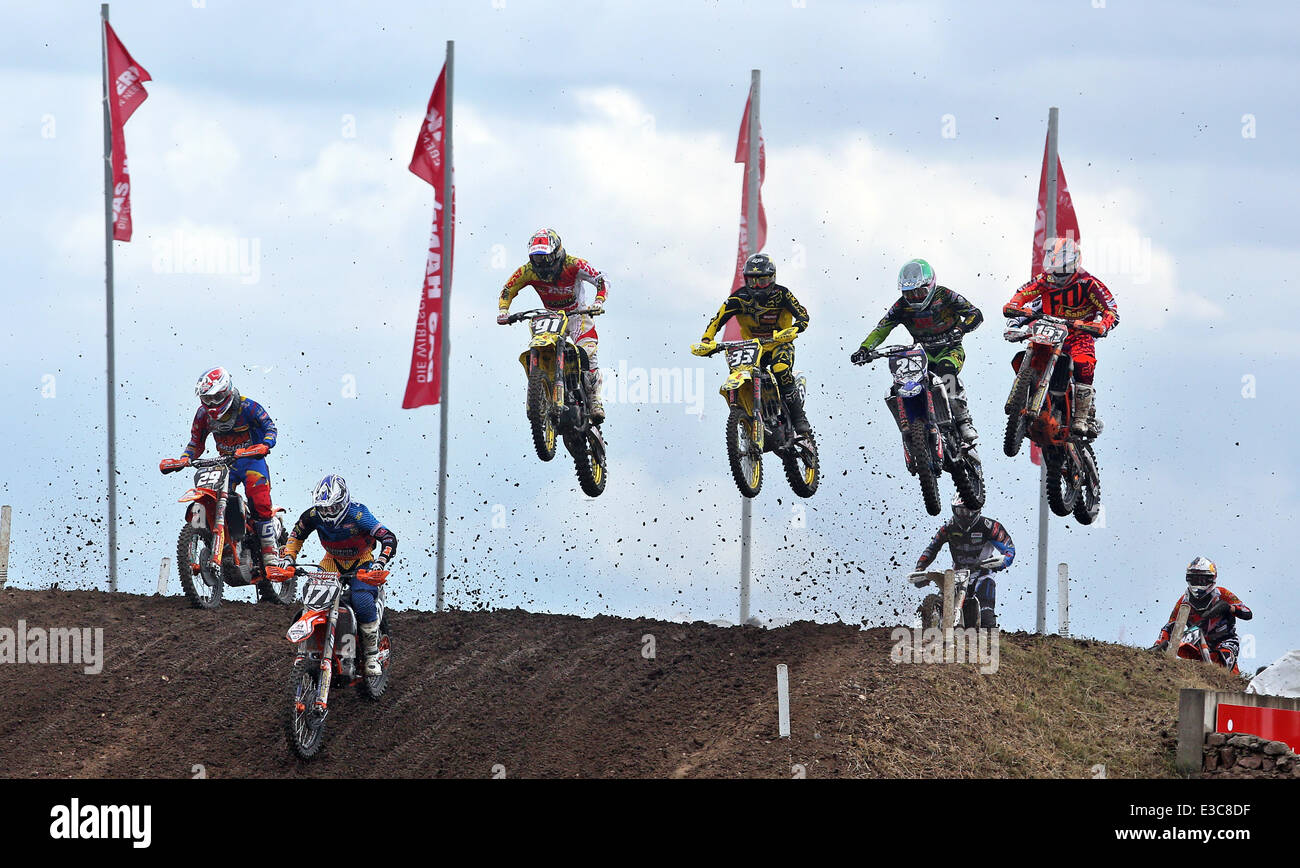 Teutschenthal, Germany. 22nd June, 2014. Motocross riders start the ...