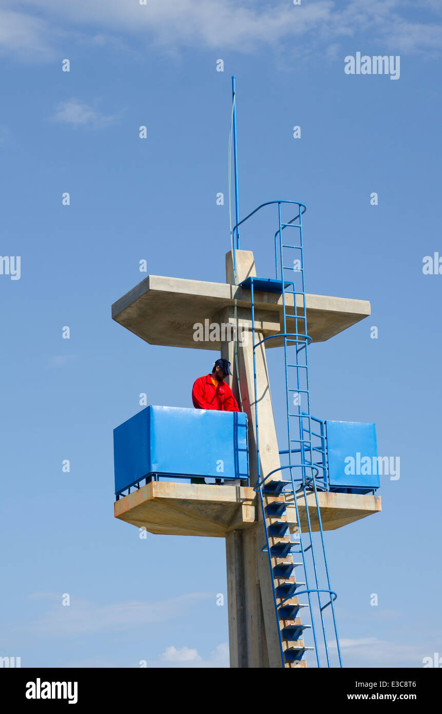 Concrete lifeguard watchtower over a Mediterranean beach, Torremolinos ...