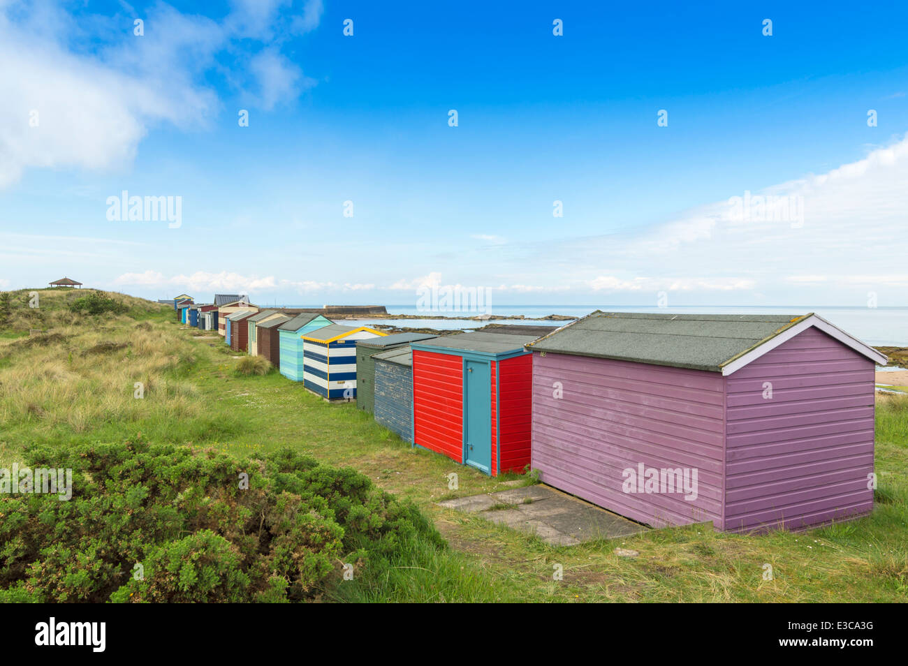 COLOURED CHALETS OR BEACH HUTS ON HOPEMAN BEACH MORAY COAST SCOTLAND ...