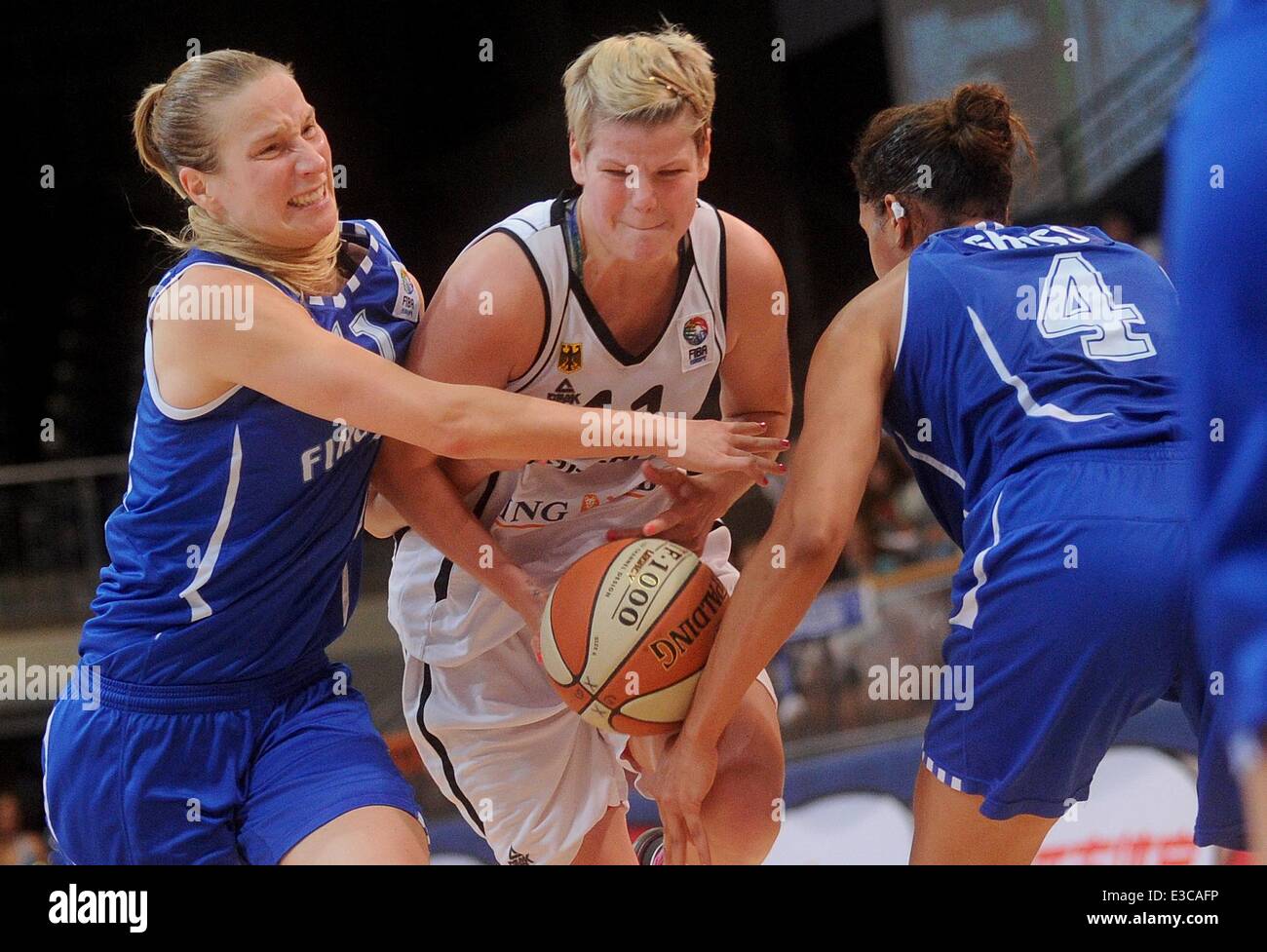 Germany's Margret Skuballa (C) in action against Finland's Heta ...