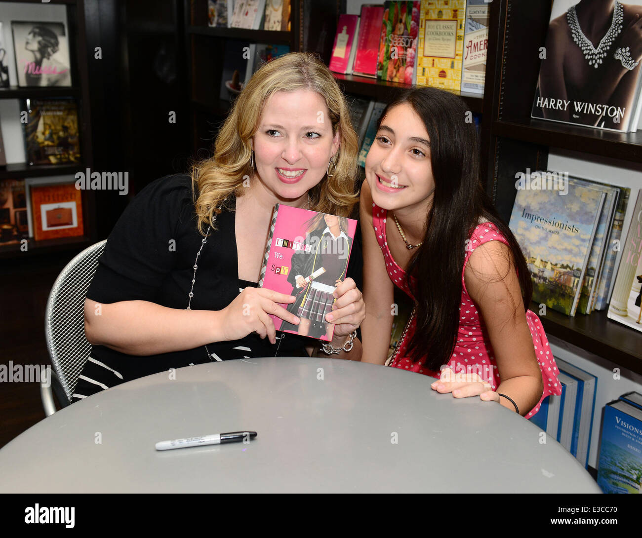 Ally Carter greets fans and signs copies of her book 'United We Spy' at ...