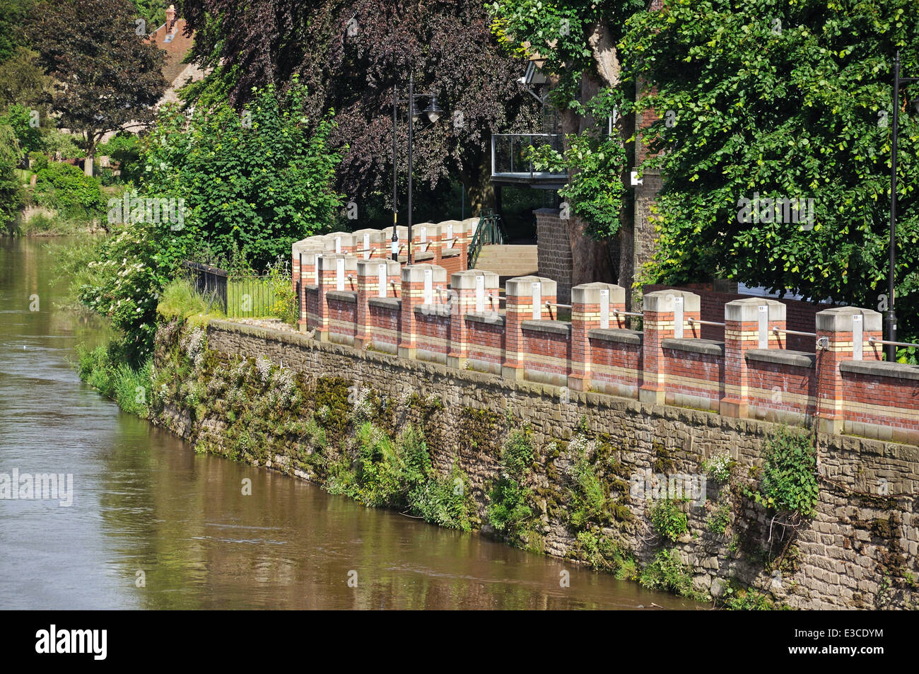 Flood defence wall barrier along the River Wye, Hereford, Herefordshire ...